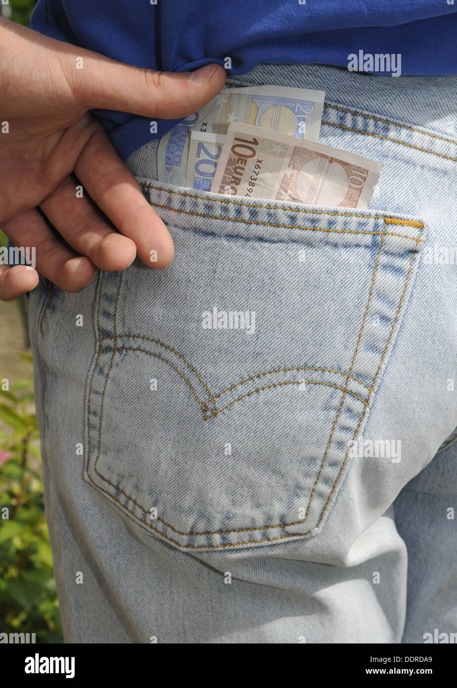 Money In Pocket Stock Photo - Alamy