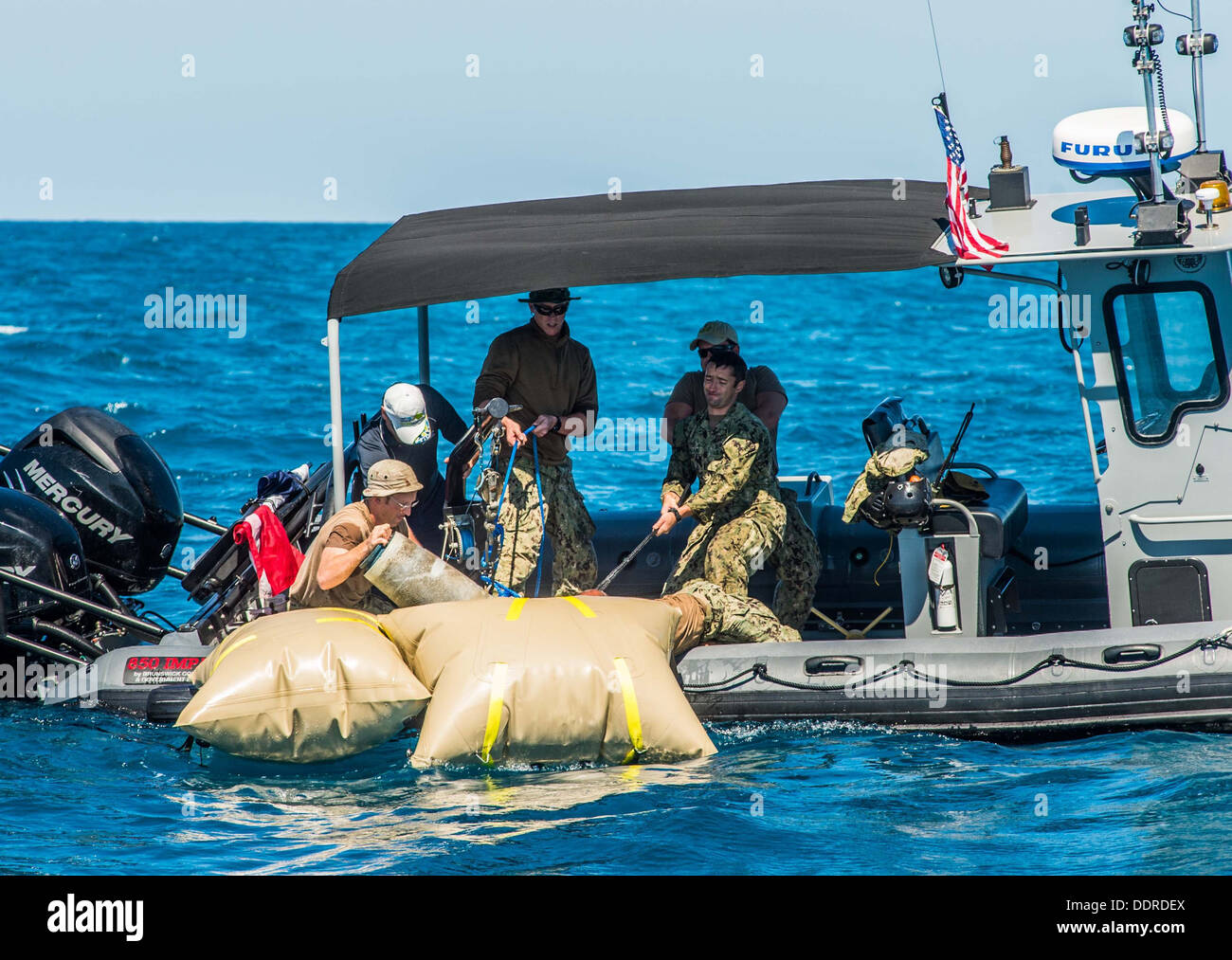 Members of explosive ordnance disposal mobile unit eodmu 5 hi-res stock ...