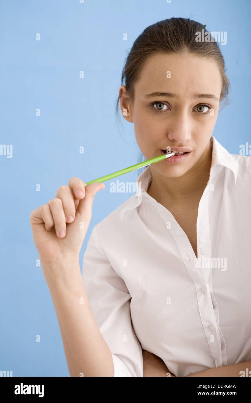 Mouth biting pencil hi-res stock photography and images - Alamy