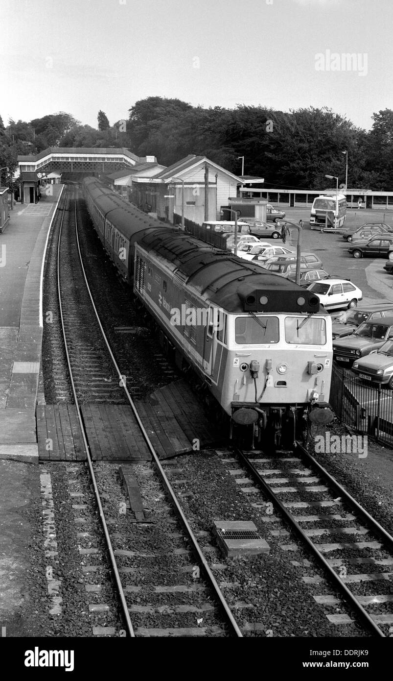 Class 50 diesel locomotive No. 50026 "Indomitable" pulling train at St ...