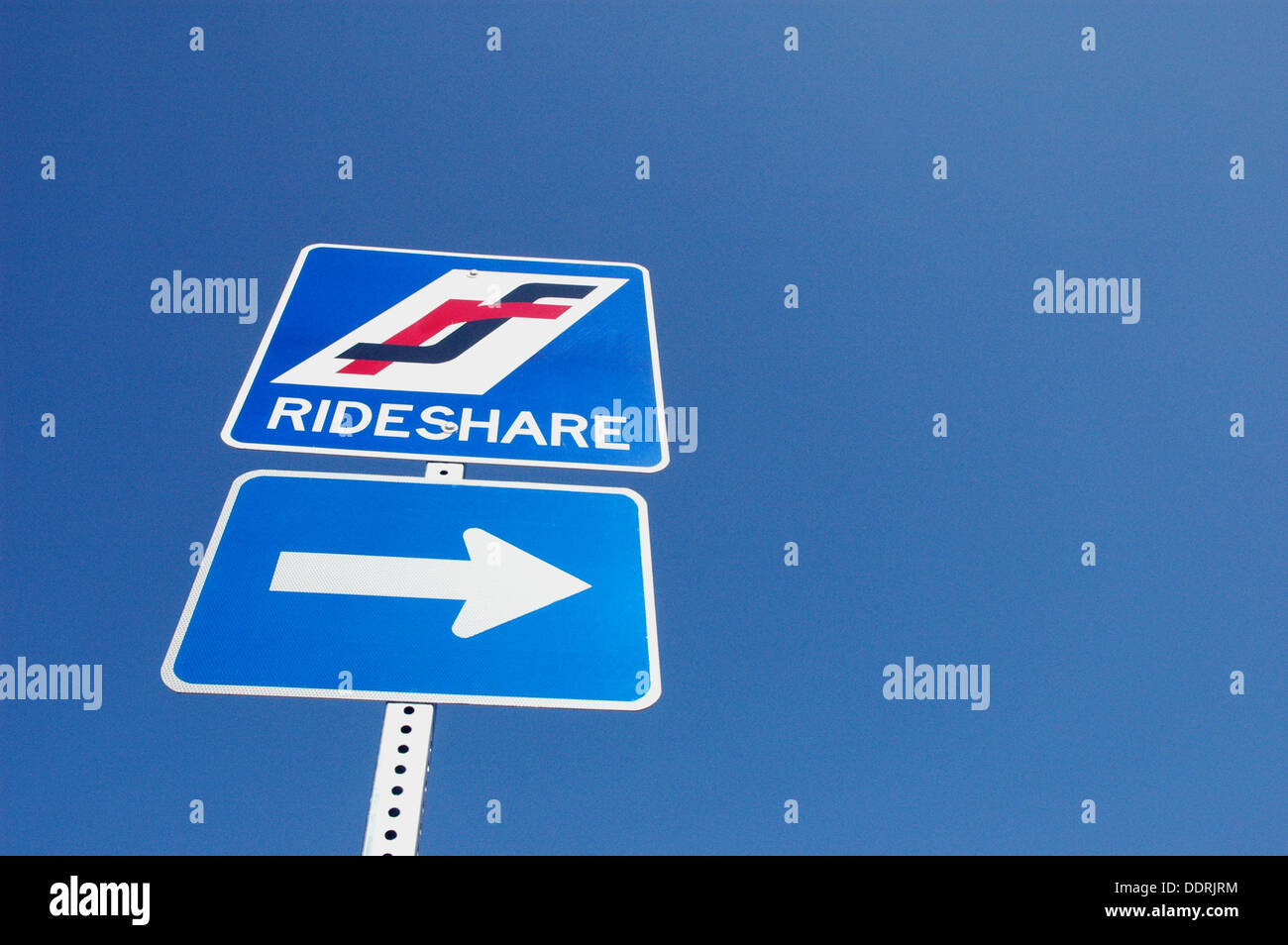 Public and Rideshare buses share location signs and directions Stock ...