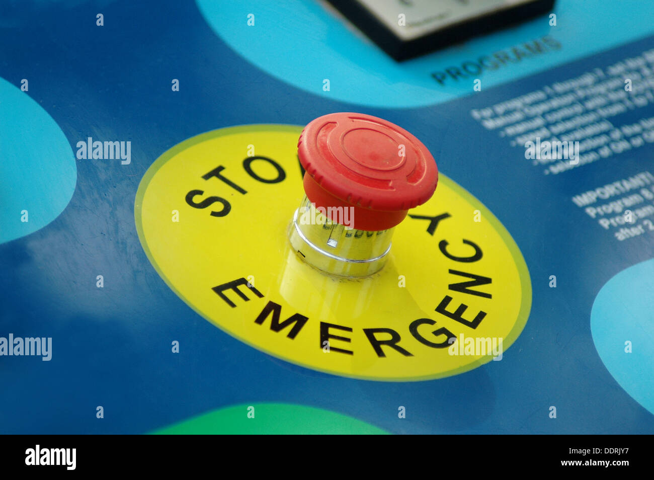 Stop button on ride at fair for emergency Stock Photo - Alamy