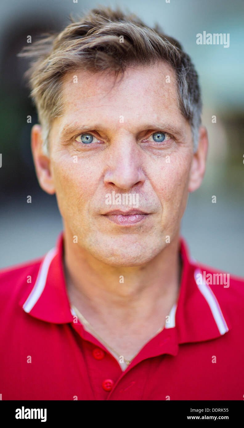 Photographer Erwin Olaf stands on Straussberger Platz in Berlin ...