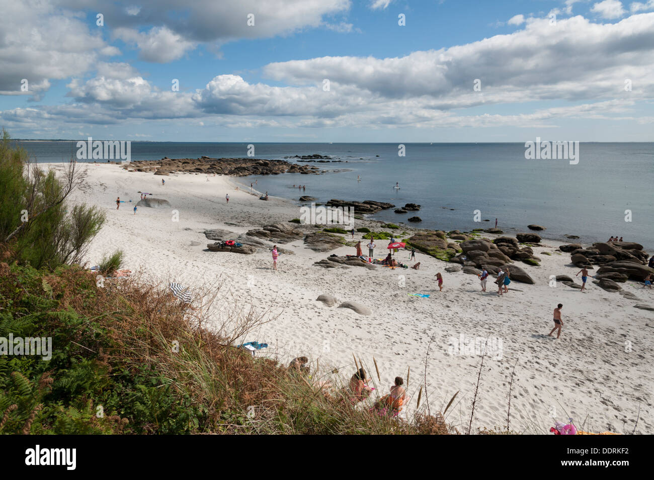 The beach with people relaxing at Beg Meil Brittany France Stock Photo ...
