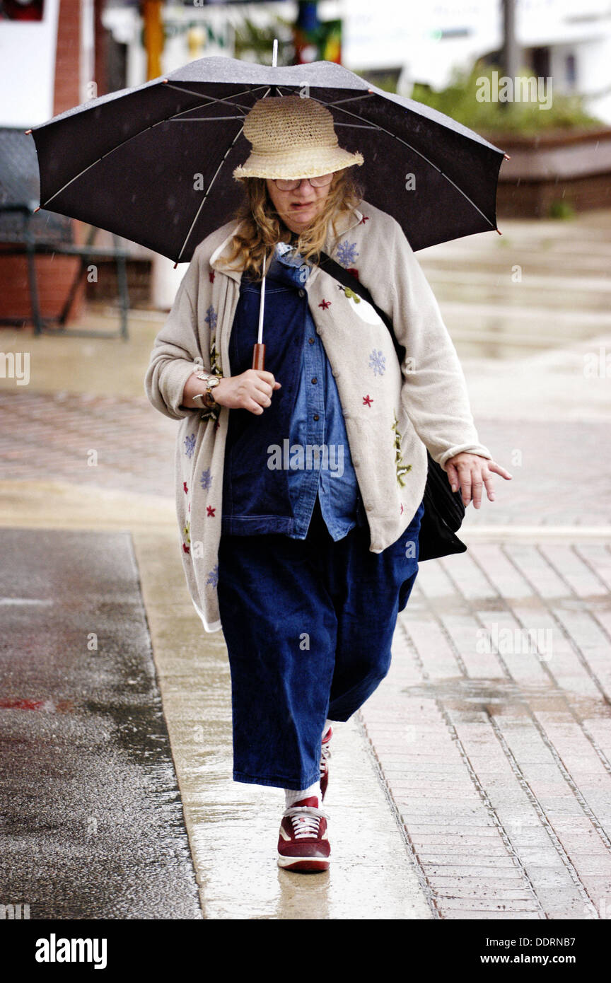 Getting caught in the rain hi-res stock photography and images - Alamy