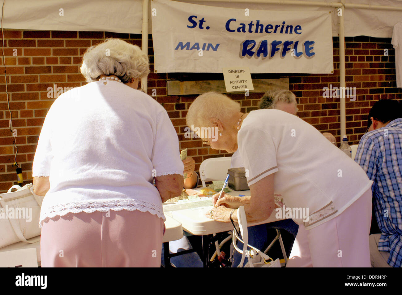Charity table at fair hi-res stock photography and images - Alamy