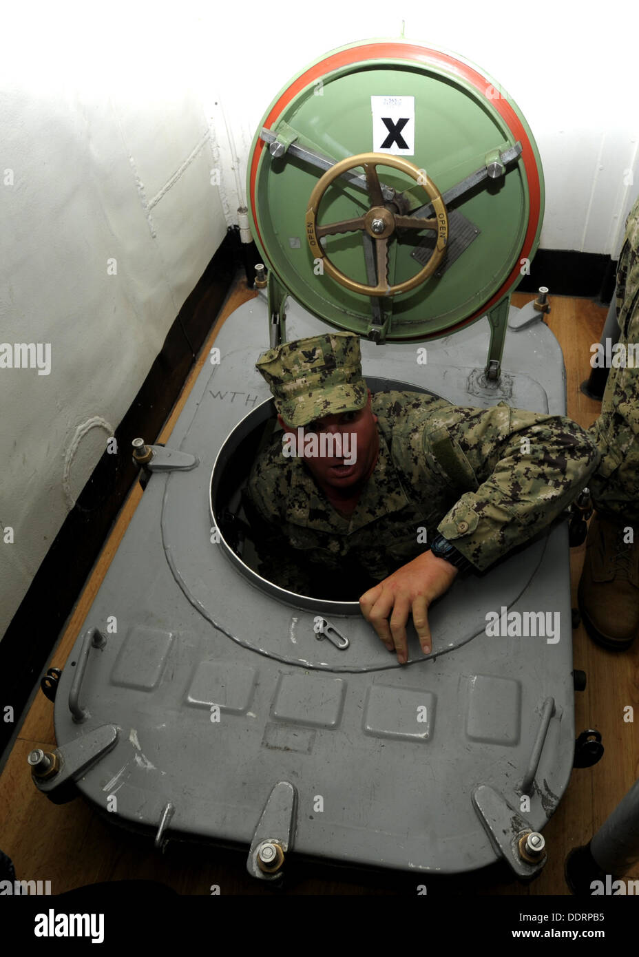 Seabees from Naval Mobile Construction Battalion (NMCB) 3 climb a ...