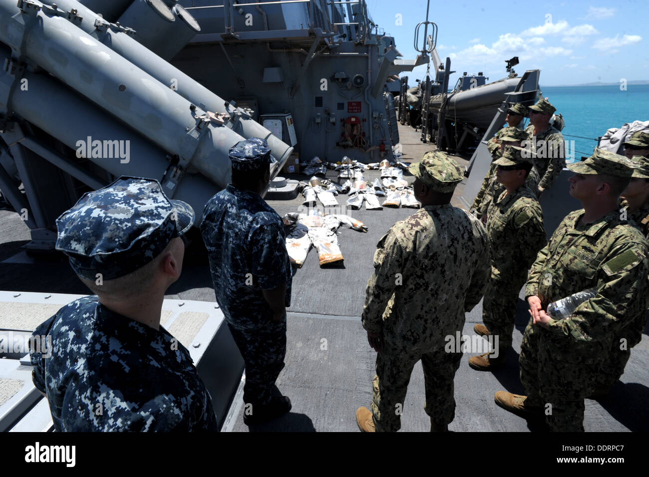 Seabees from Naval Mobile Construction Battalion (NMCB) 3 are shown ...