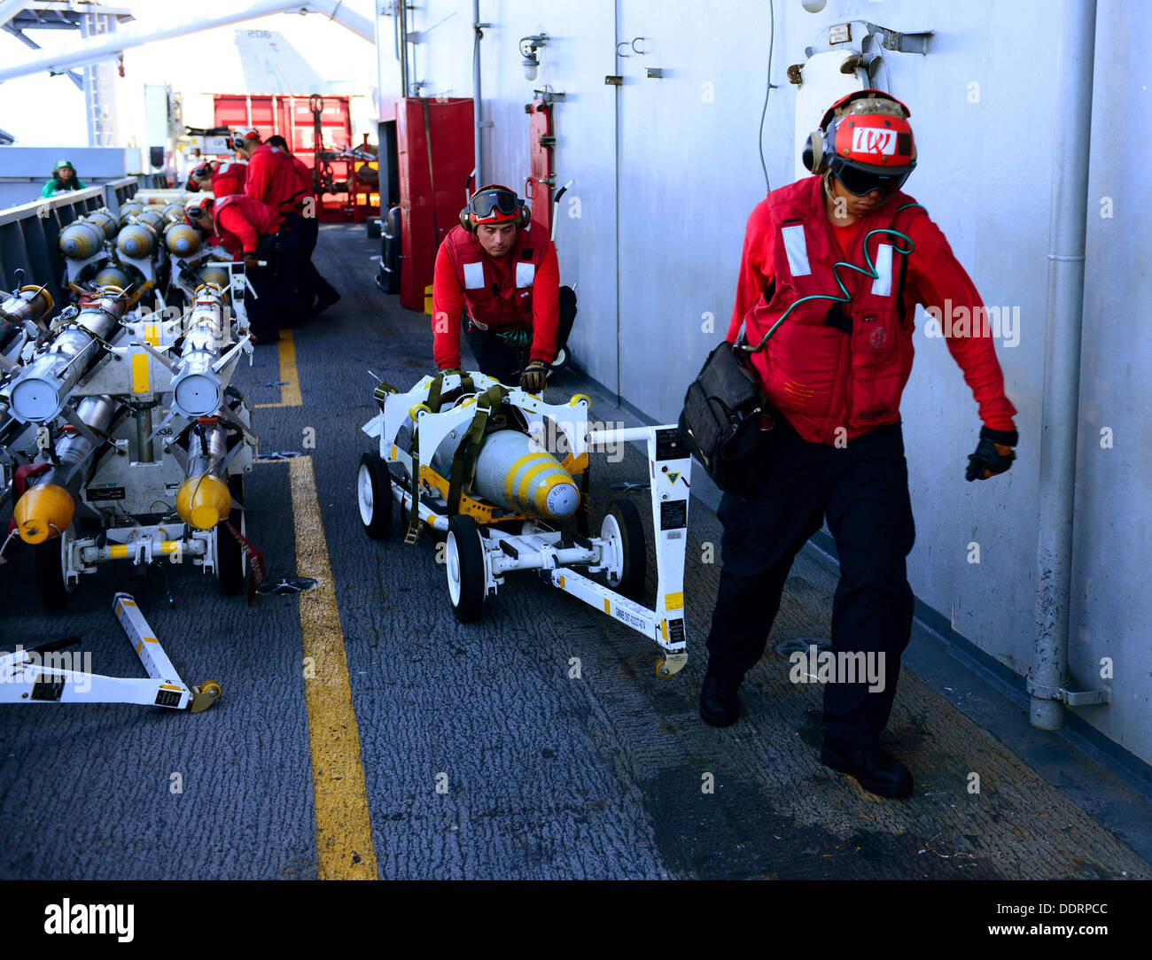 U.S. Navy Aviation Ordnanceman Airmen Jackie Kazziahand Darrius Griffin ...