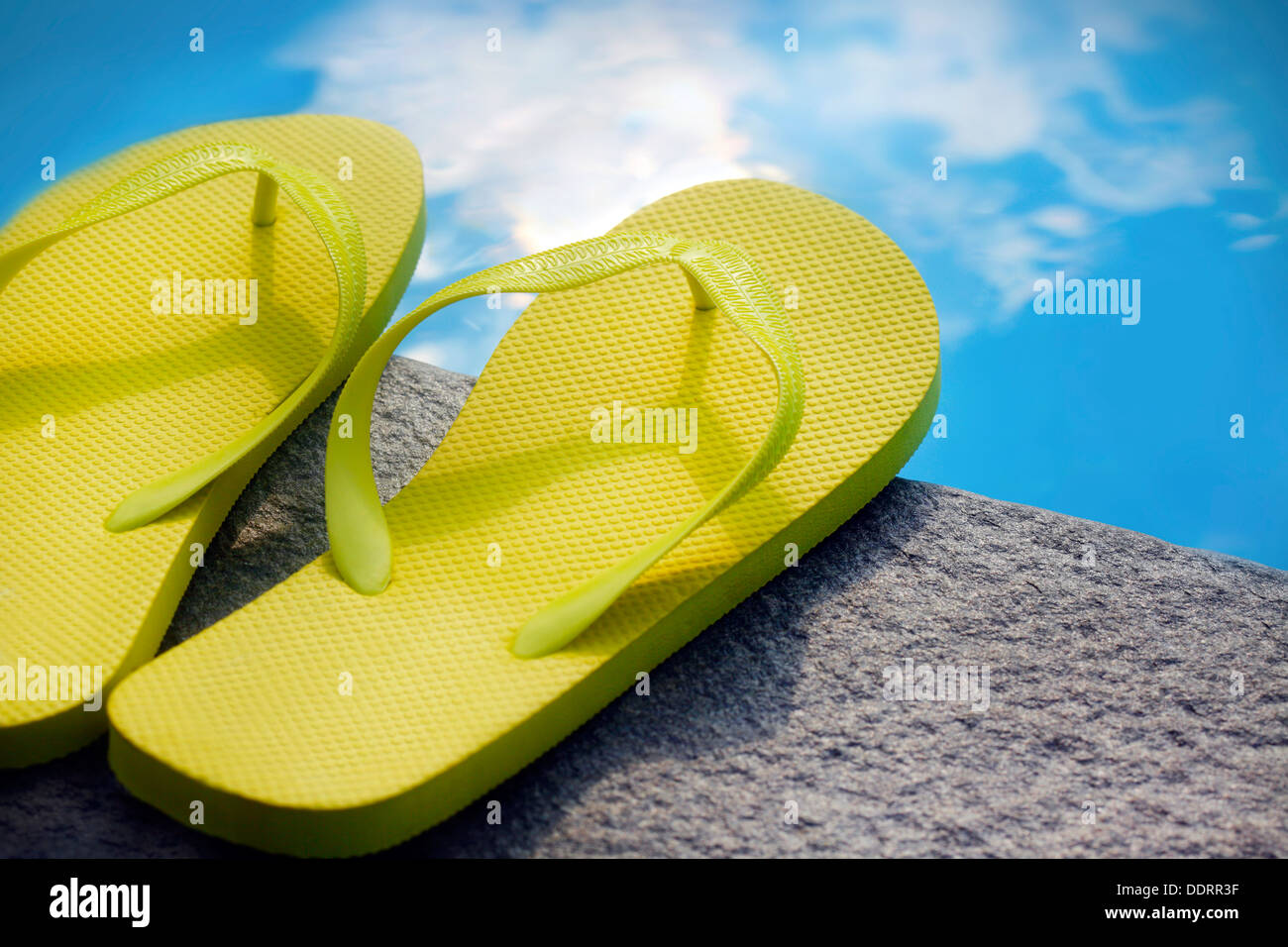sandals by a pool Stock Photo - Alamy