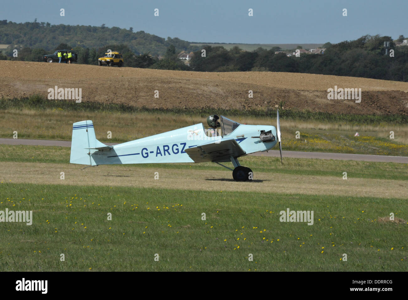 A biplane landing at an airstrip in Shoreham England Stock Photo - Alamy