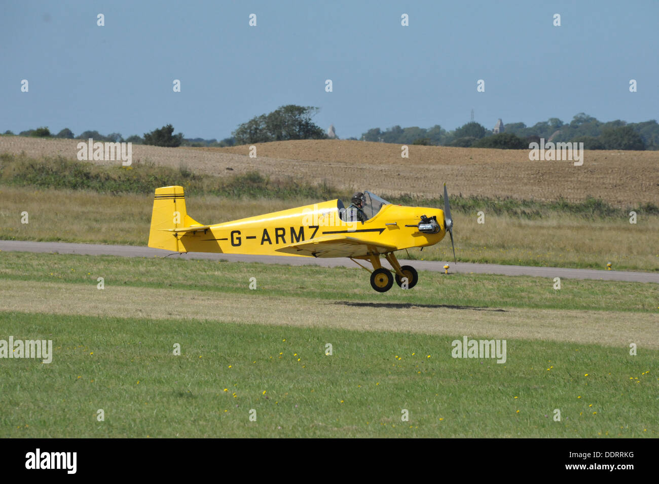 A biplane landing at an airstrip in Shoreham England Stock Photo - Alamy