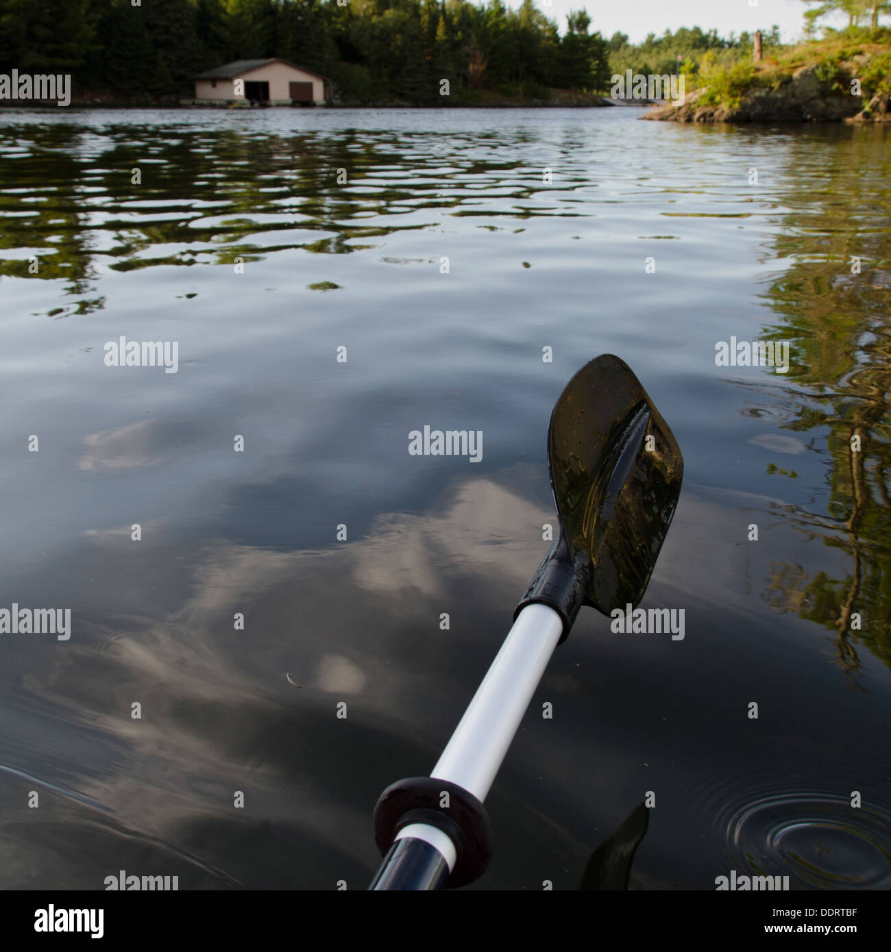 Oar above the water surface, Lake of The Woods, Ontario, Canada Stock ...