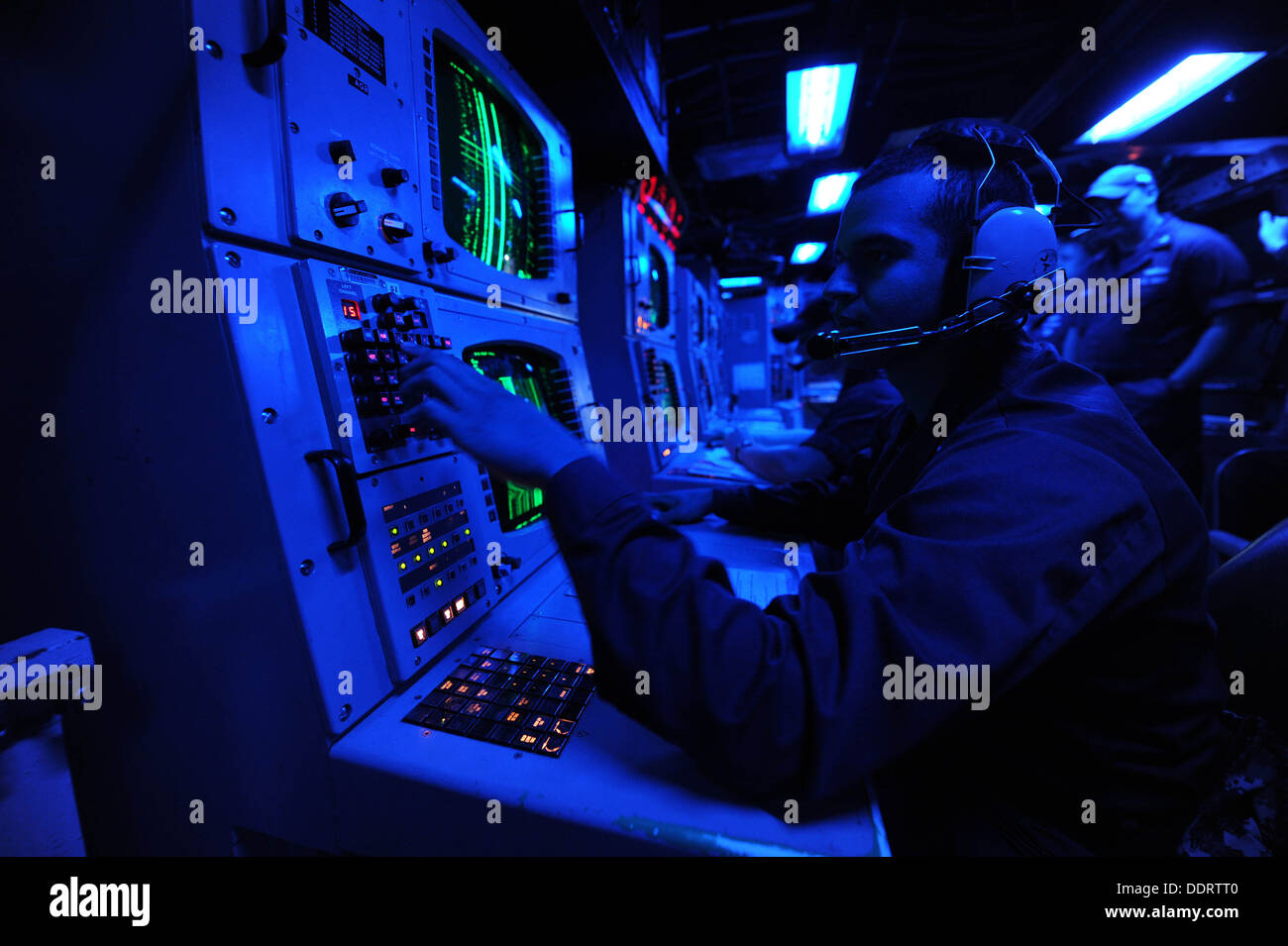 Sonar Technician (Surface) 2nd Class Jacob Cooper performs passive ...