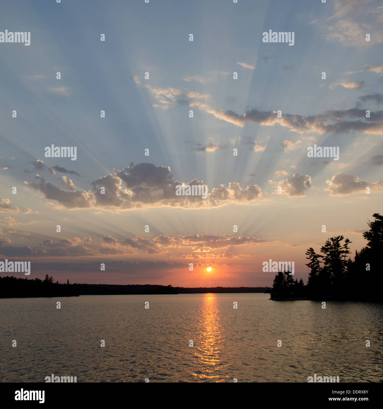 Sunset over a lake, Lake of The Woods, Ontario, Canada Stock Photo - Alamy