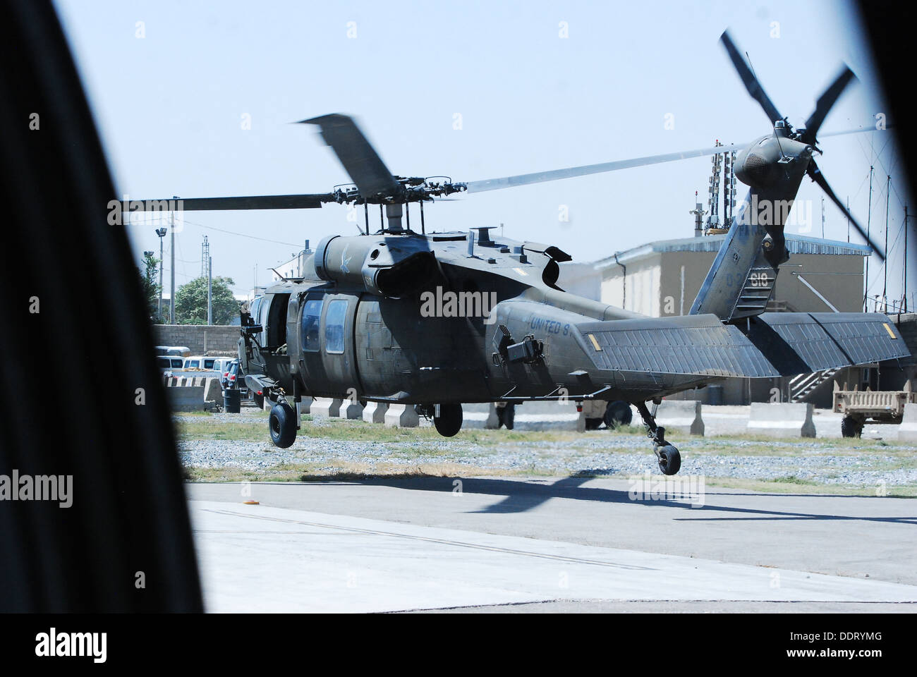 A UH-60L Black Hawk helicopter crewed by 1st Lt. Chuck Nadd, Chief ...