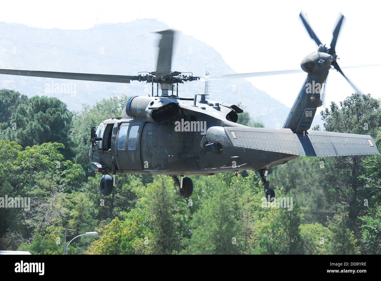 A UH-60L Black Hawk helicopter crewed by 1st Lt. Chuck Nadd, Chief ...