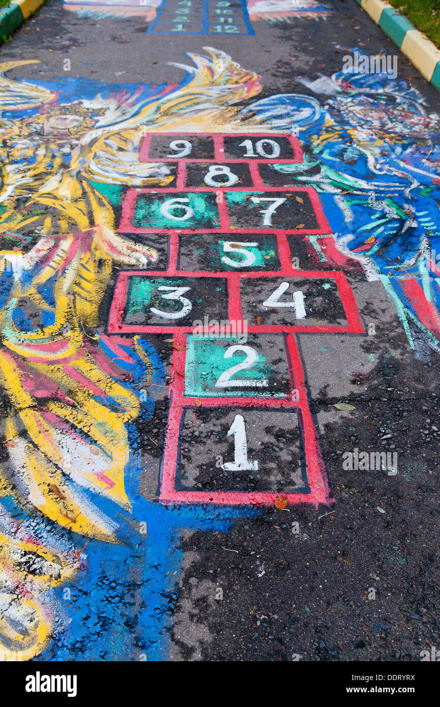 Hopscotch court drawn by chalk on urban pavement Stock Photo - Alamy