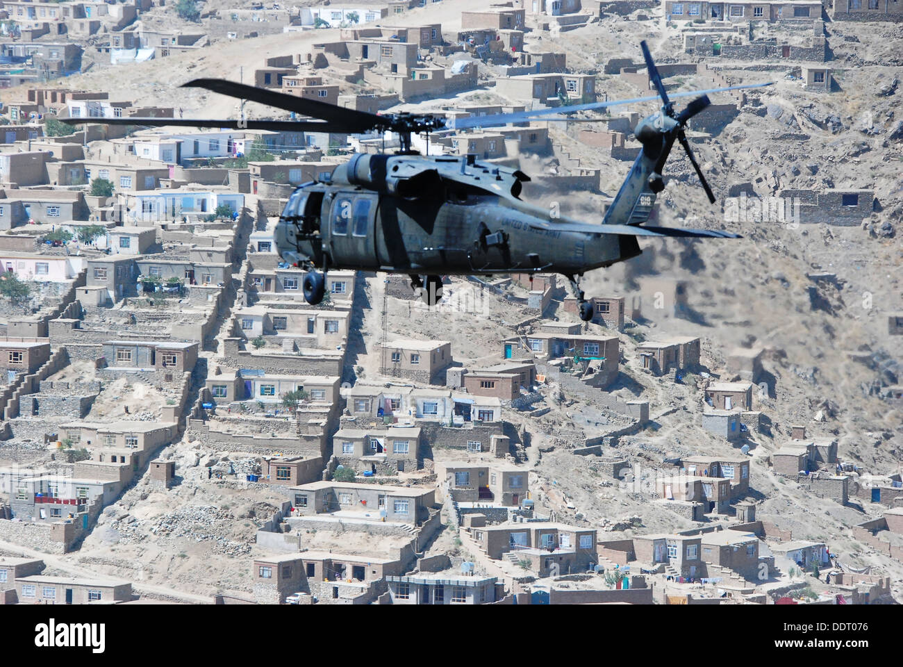 A UH-60L Black Hawk helicopter crewed by 1st Lt. Chuck Nadd, Chief ...