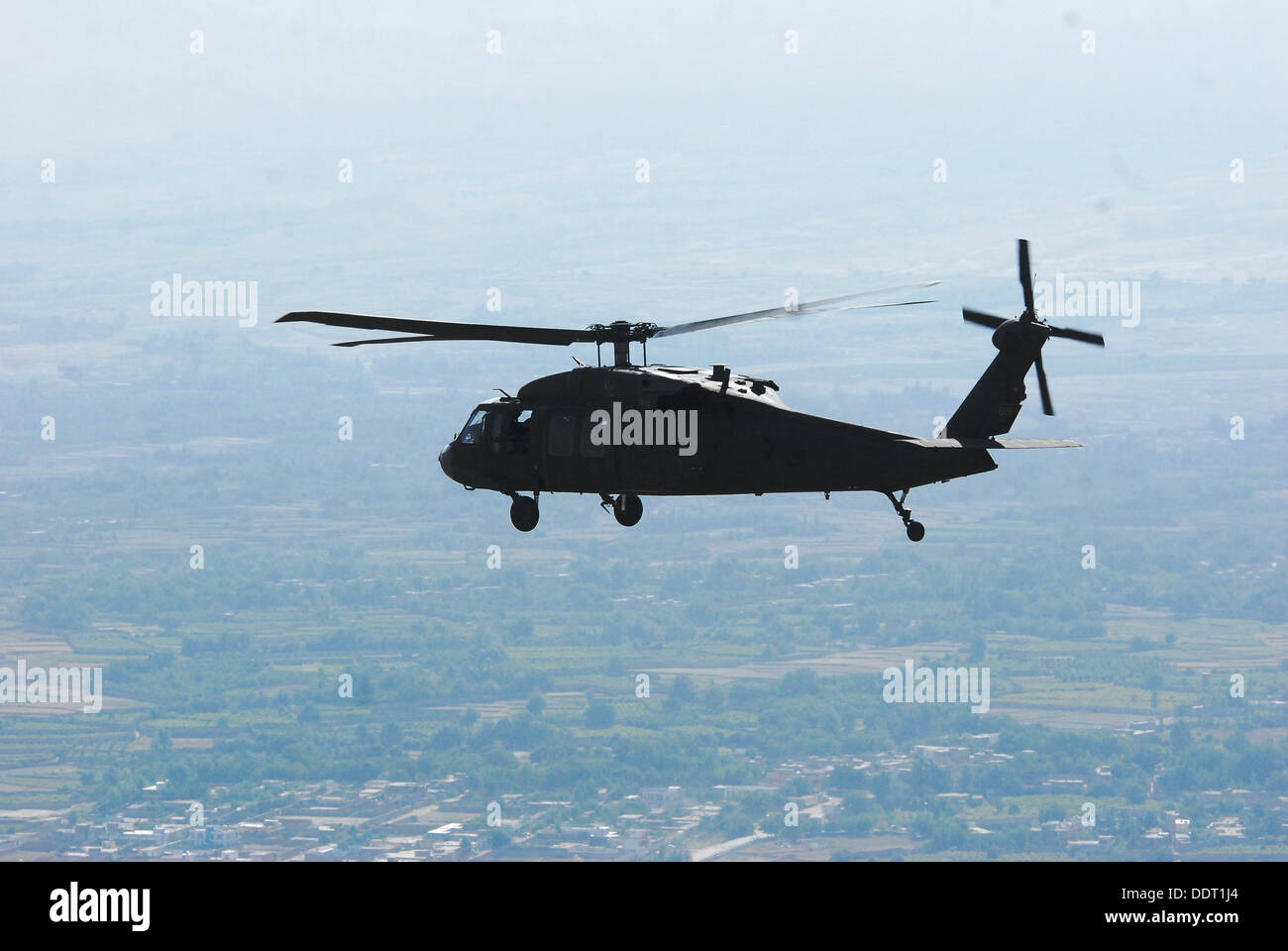 An UH-60L Black Hawk helicopter crewed by 1st Lt. Chuck Nadd, Chief ...