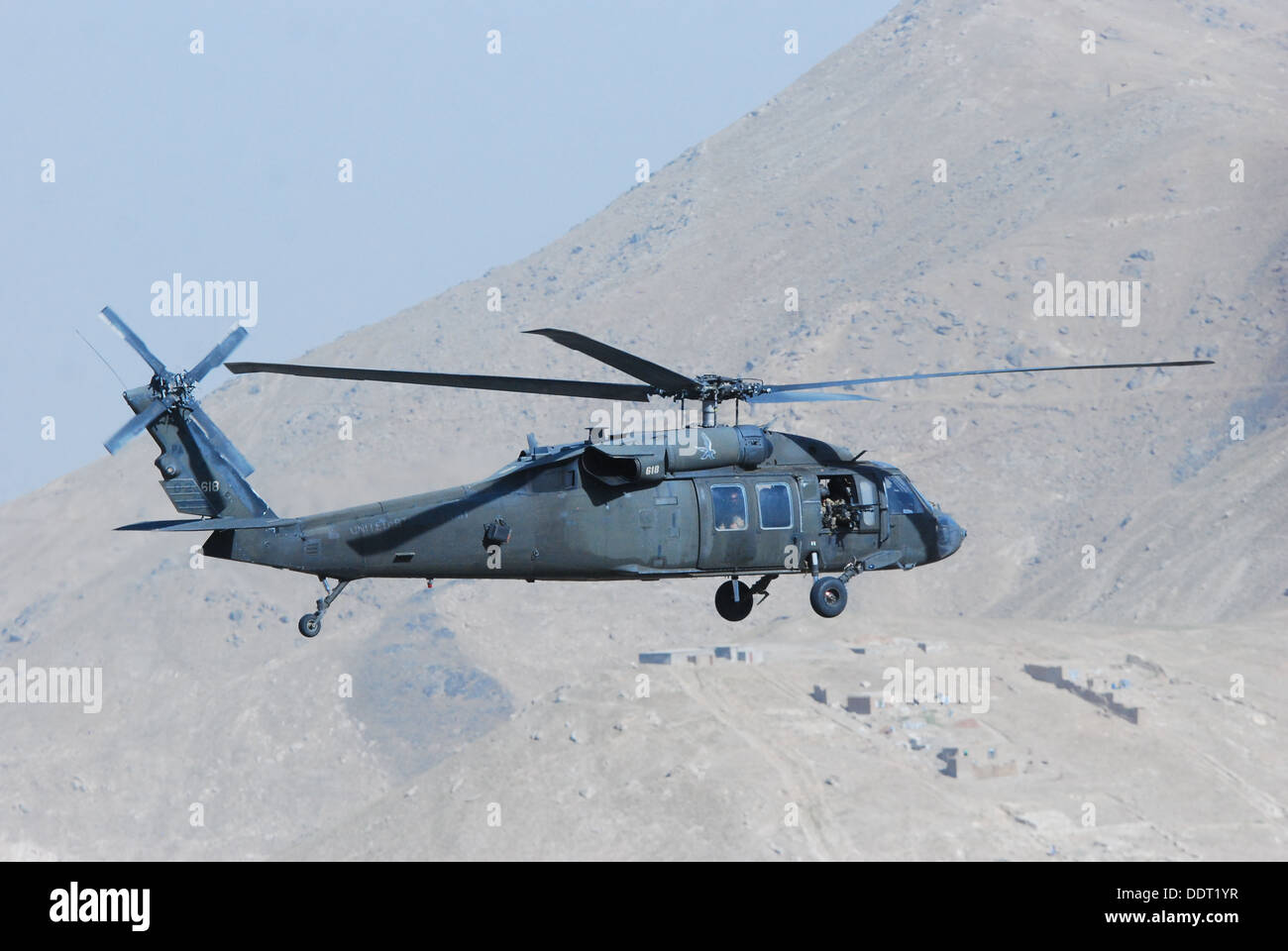 An UH-60L Black Hawk helicopter crewed by 1st Lt. Chuck Nadd, Chief ...