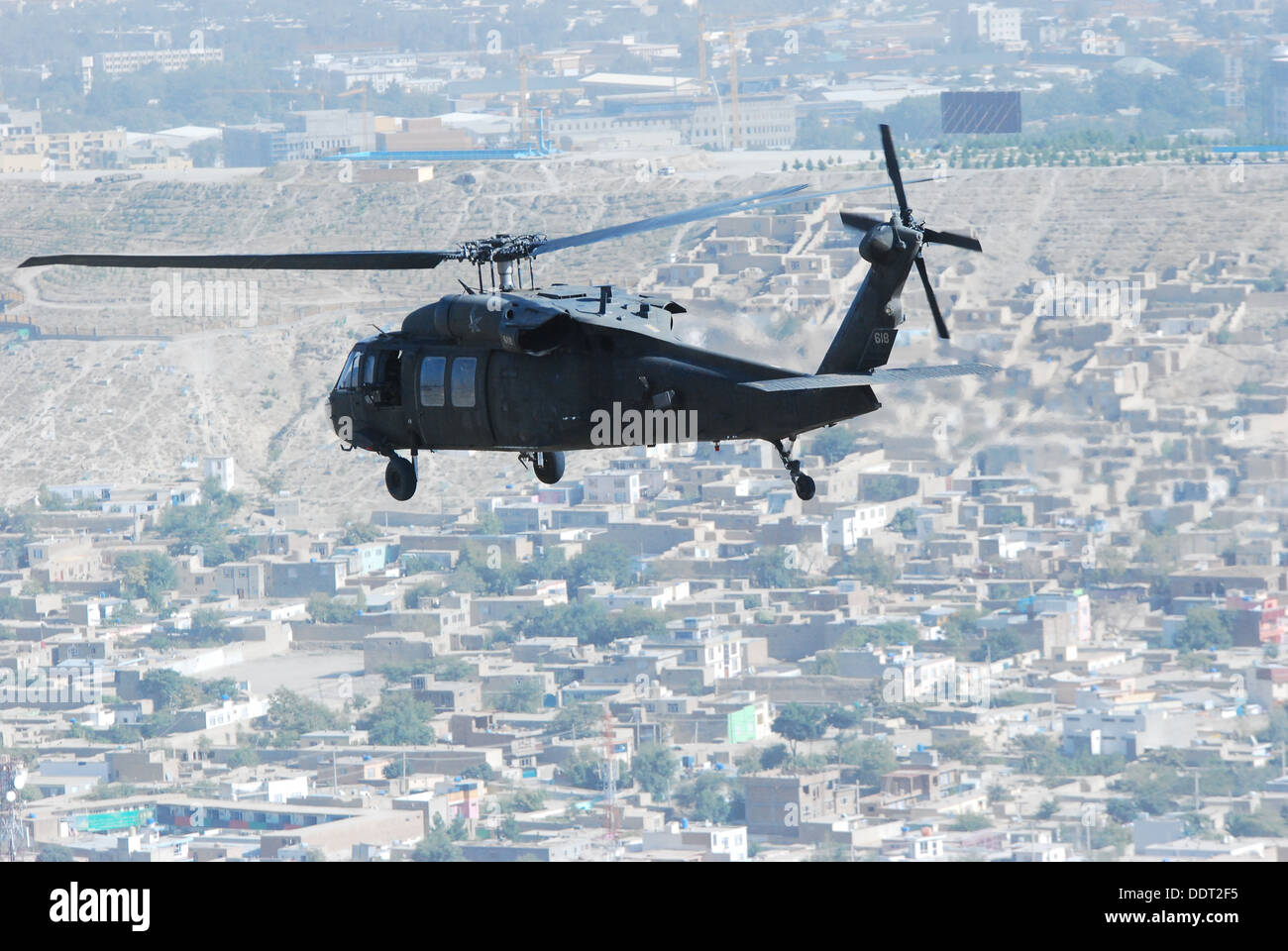An UH-60L Black Hawk helicopter crewed by 1st Lt. Chuck Nadd, Chief ...