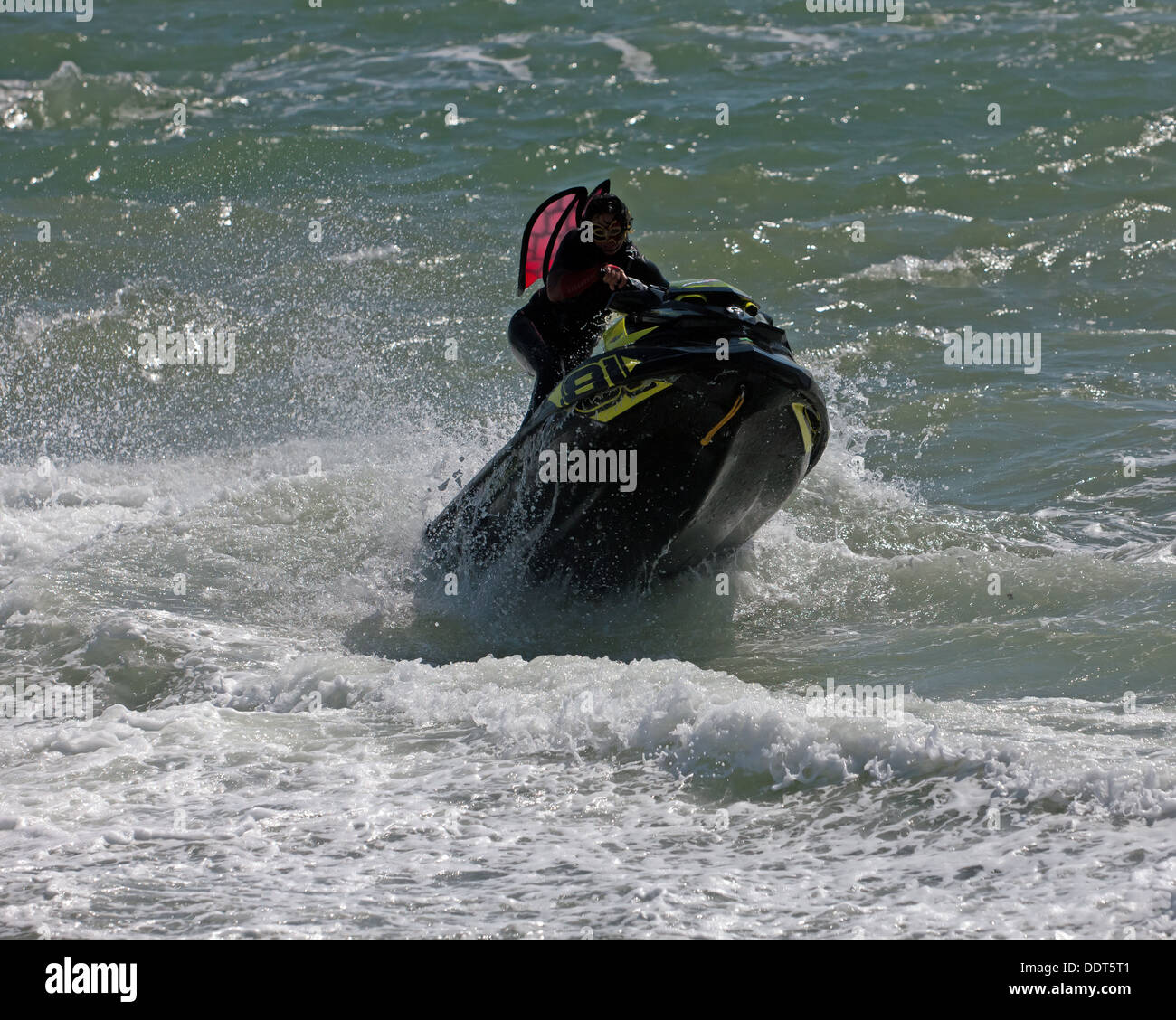 Aysha Rensink performing a dramatic jet ski stunt display on her Sea ...