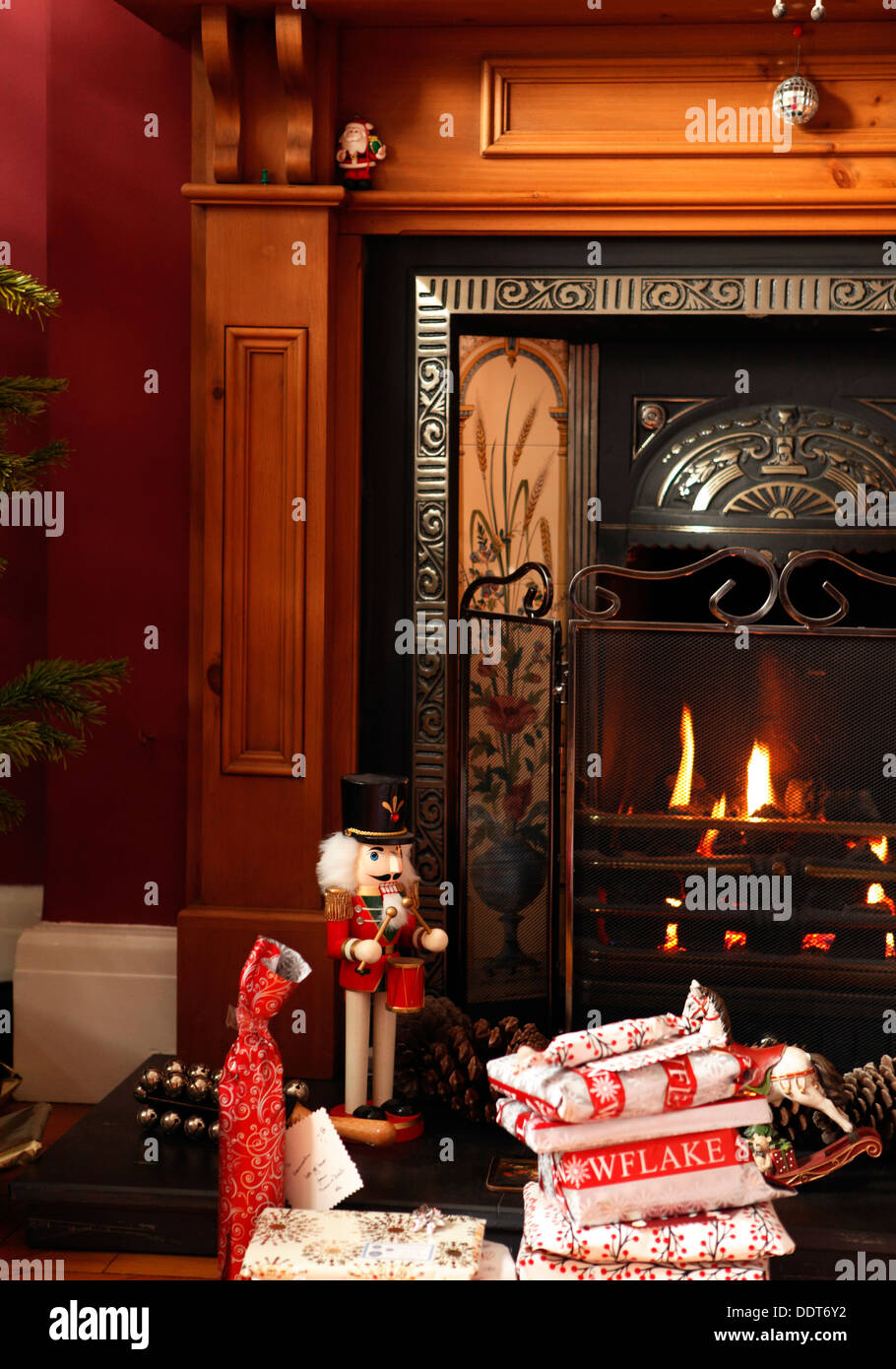 Christmas room setting with fireplace, presents, nutcracker and sleigh ...