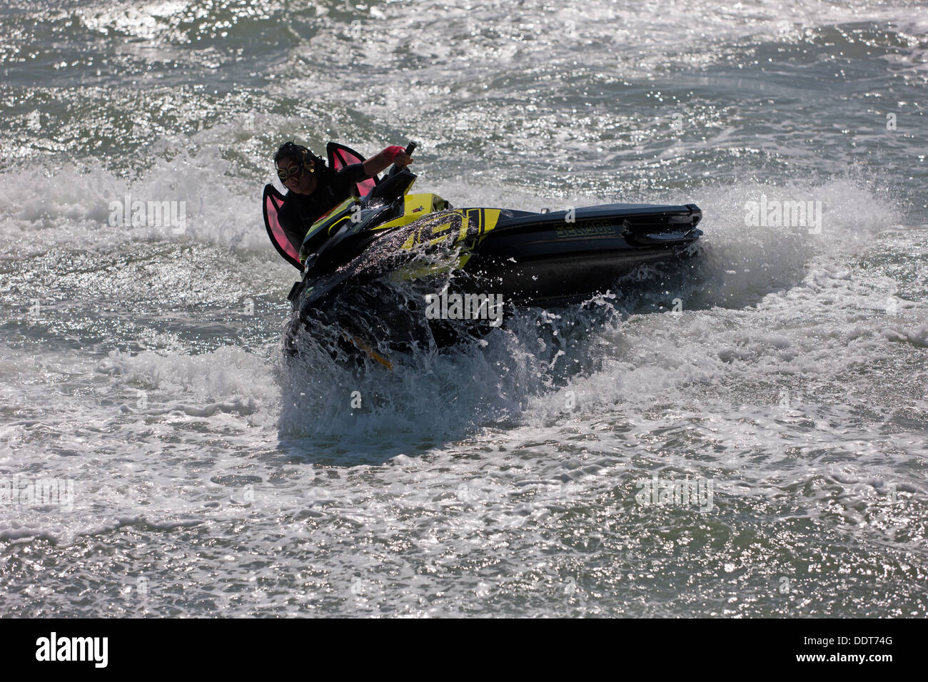 Aysha Rensink performing a dramatic jet ski stunt display on her Sea ...