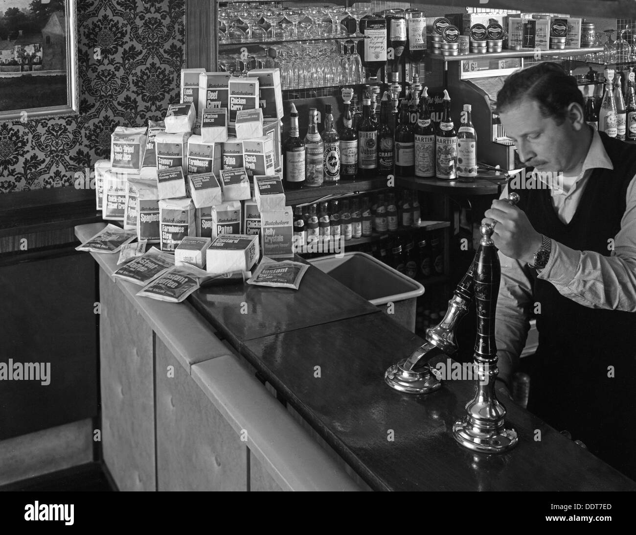 A pub landlord with a display of the Batchelors 5 day catering pack on ...