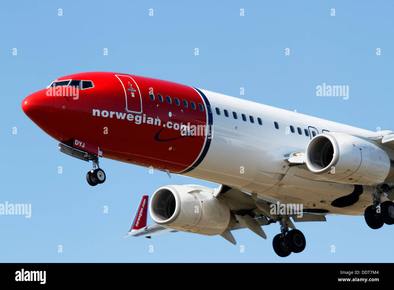 The front part and logo of Norwegian Airlines Boeing 737 on final ...