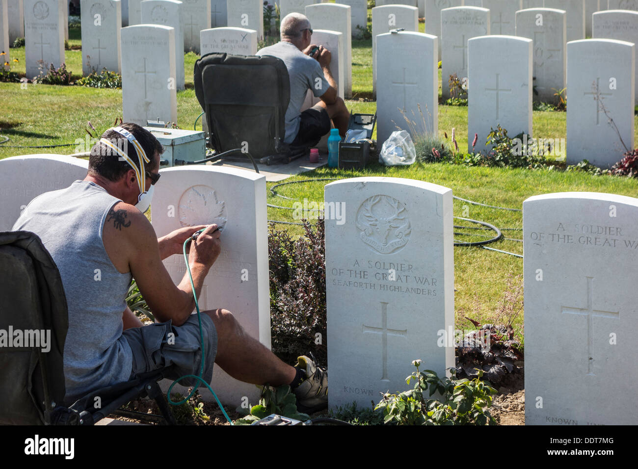 Engravers restoring headstones at Tyne Cot Cemetery of the Commonwealth ...