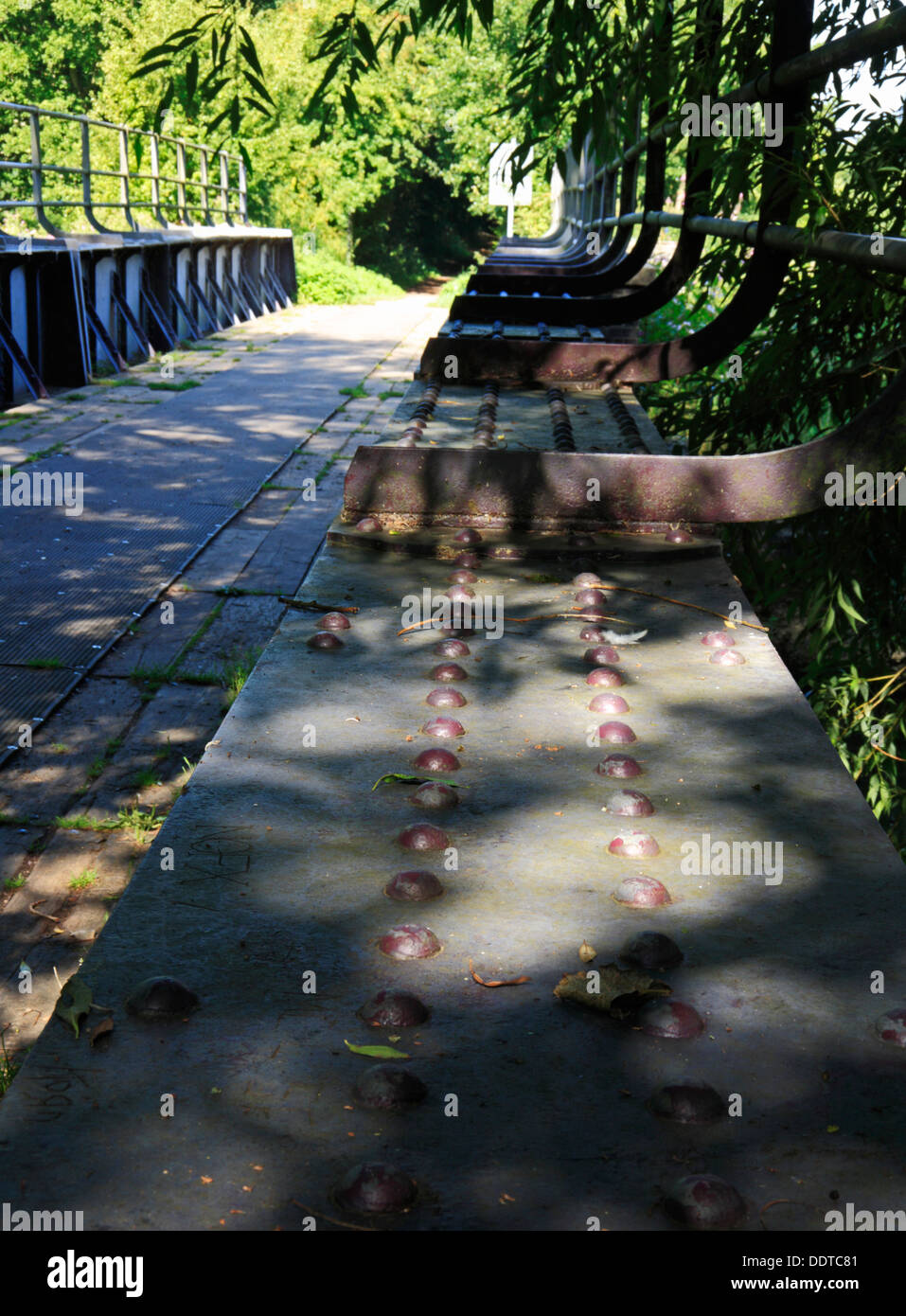 An old railway bridge crossing the River Wensum on the Marriott's Way ...