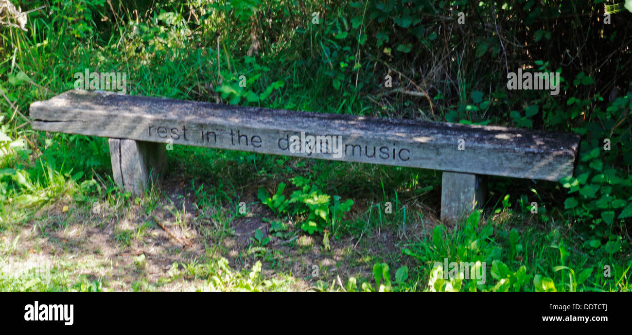 A wooden seat for rest on the Marriott's Way long distance footpath at ...