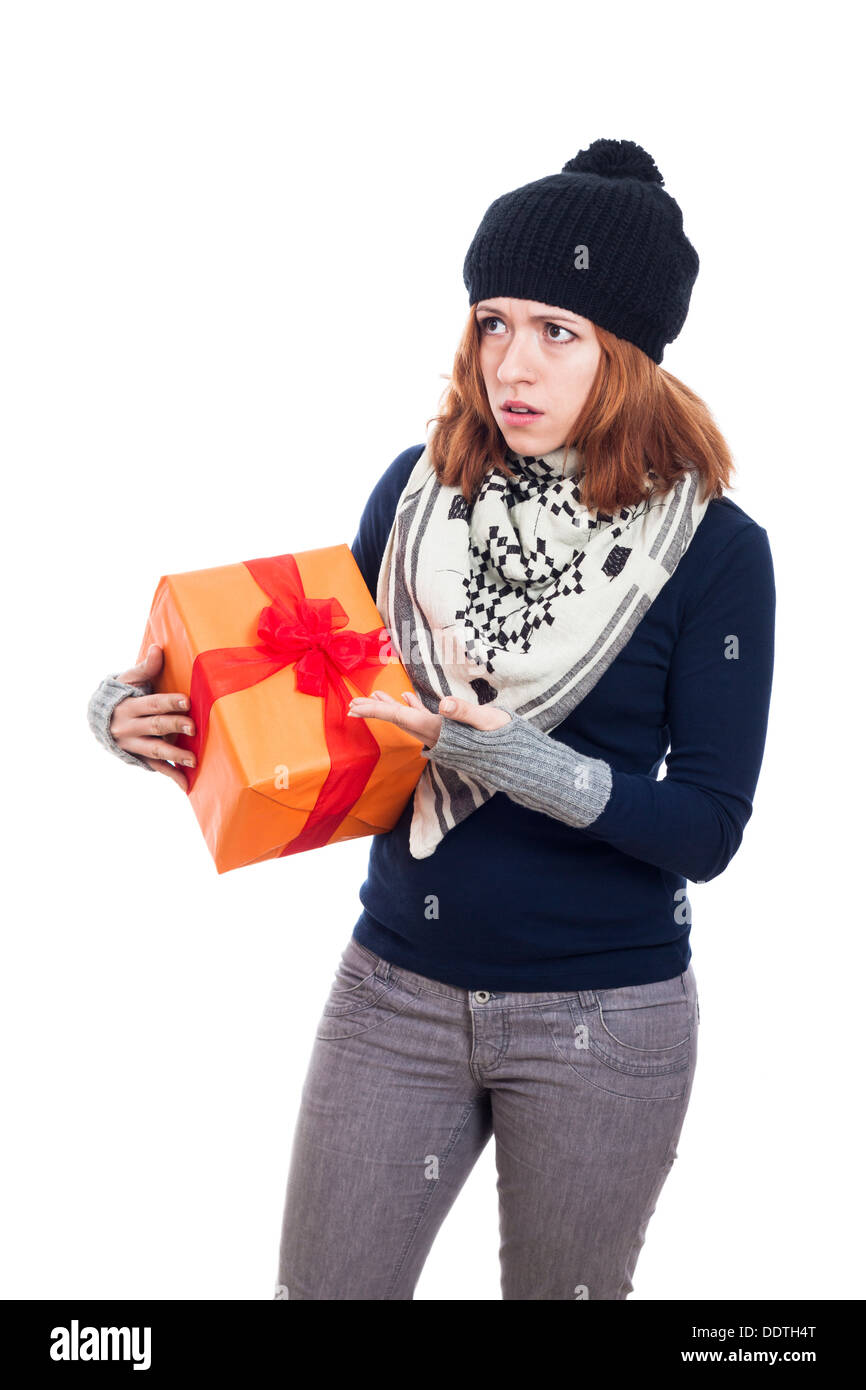 Angry winter woman holding present, isolated on white background Stock ...