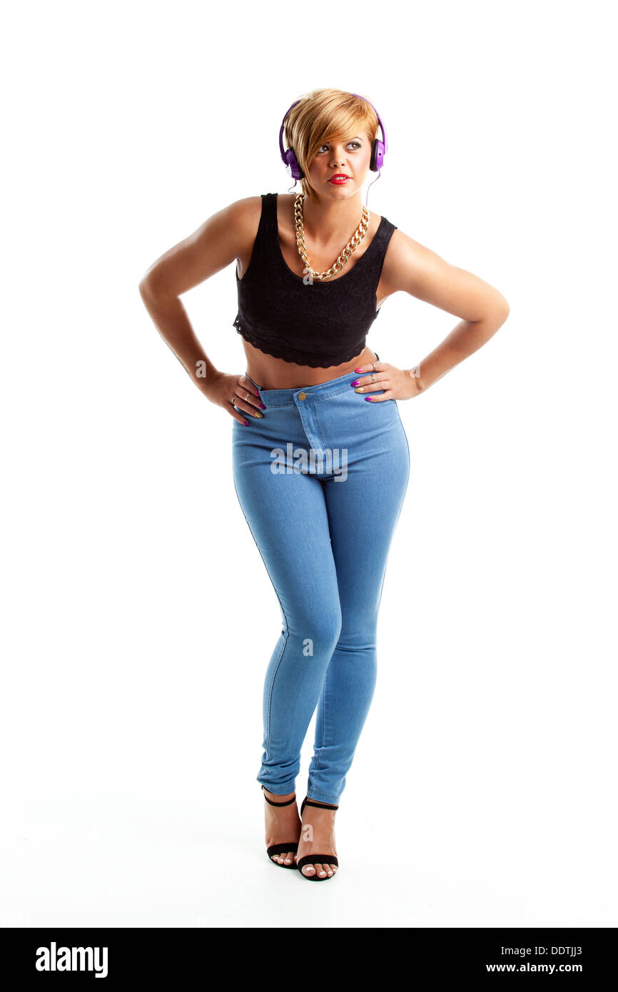 Pretty Female Model full length, listening to music Stock Photo - Alamy