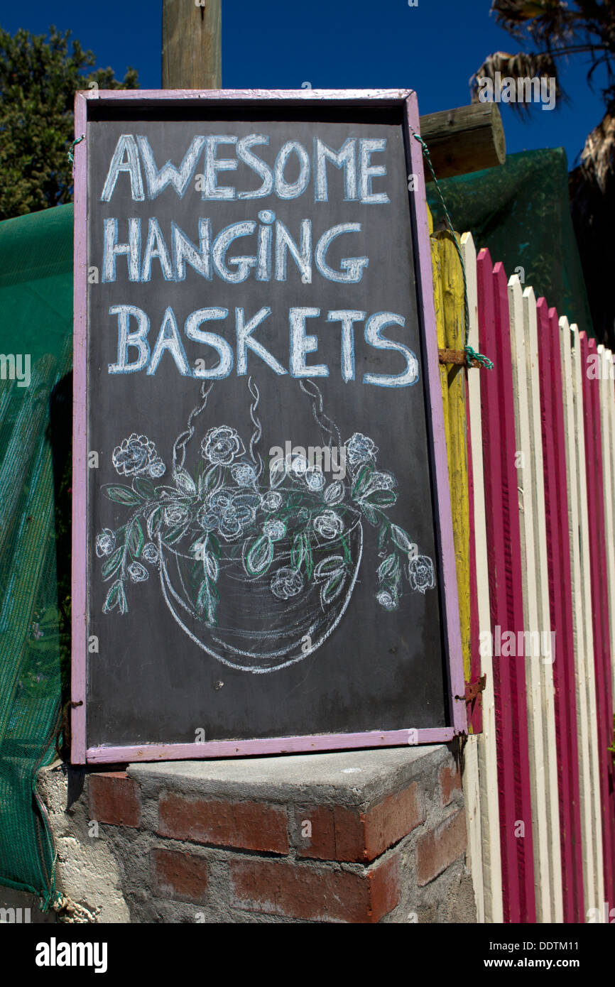 Hanging baskets sign Stock Photo - Alamy