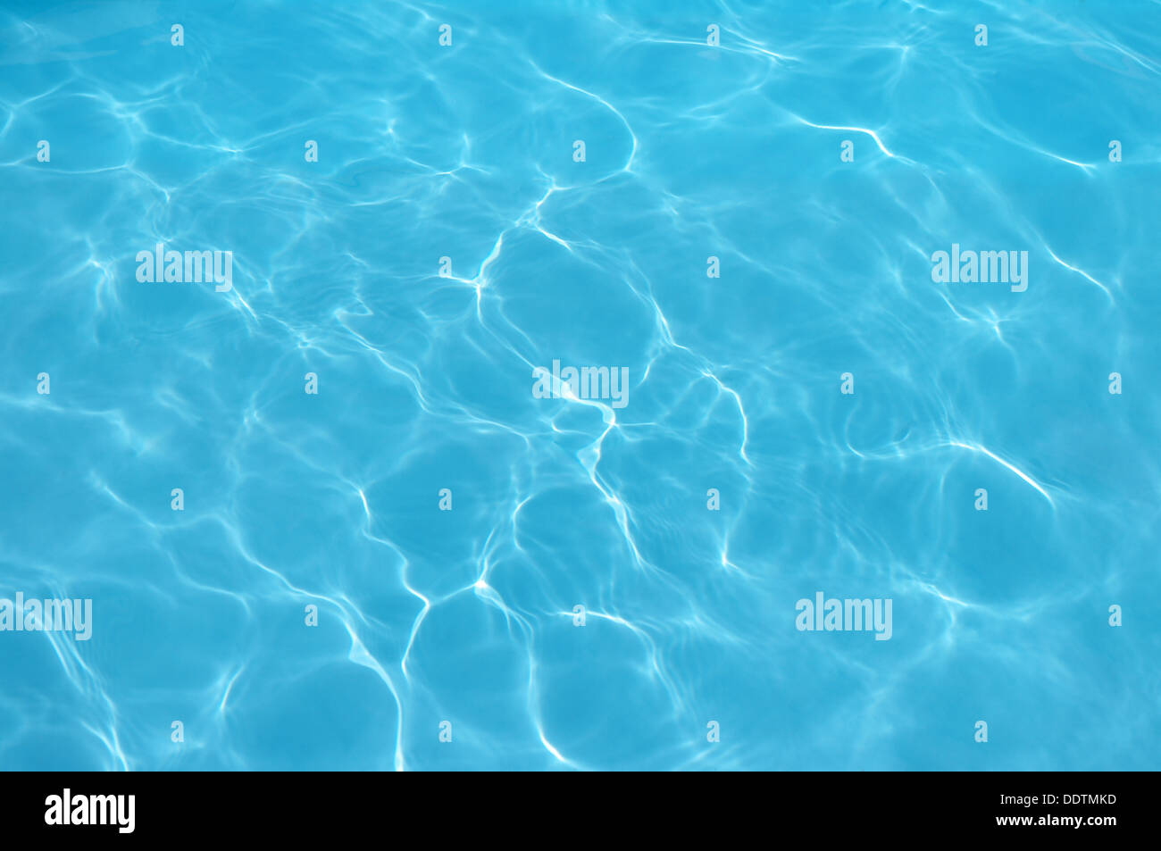 Ripples on the surface of water in blue pool Stock Photo - Alamy