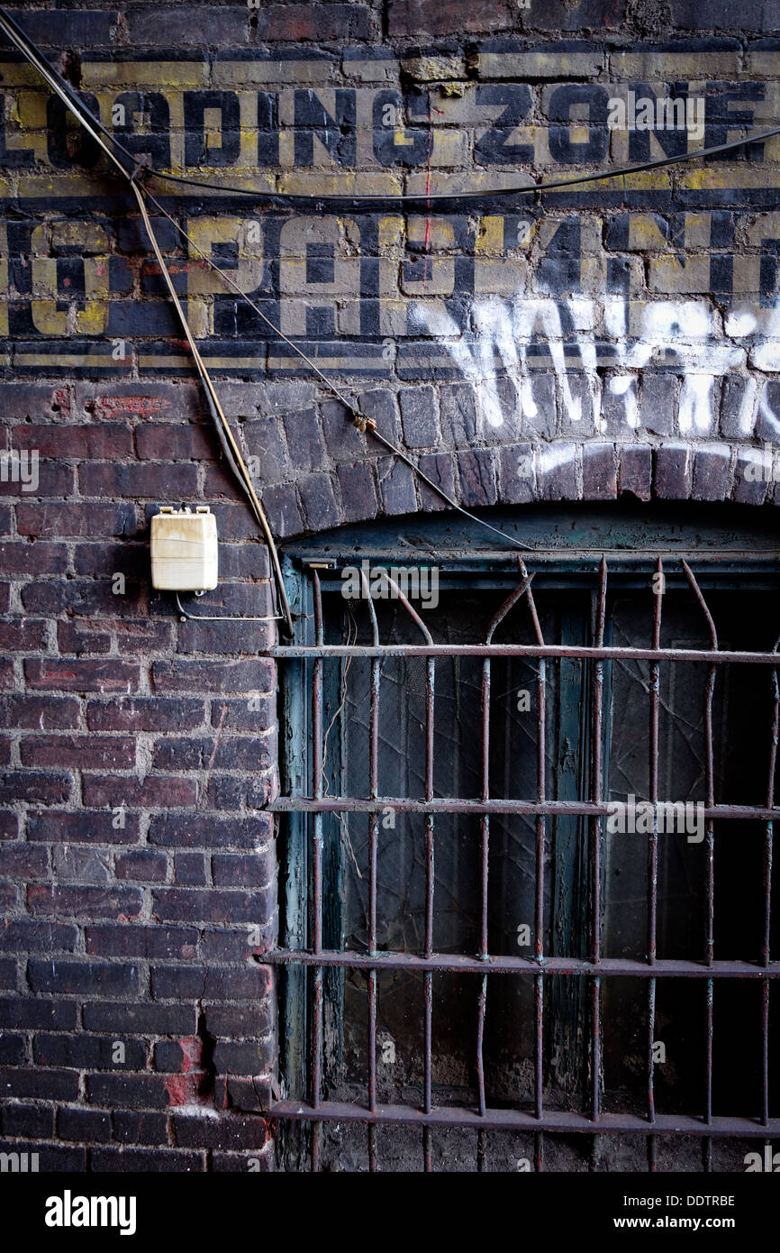 Loading zone, no parking, and graffiti make an interesting contrast to ...