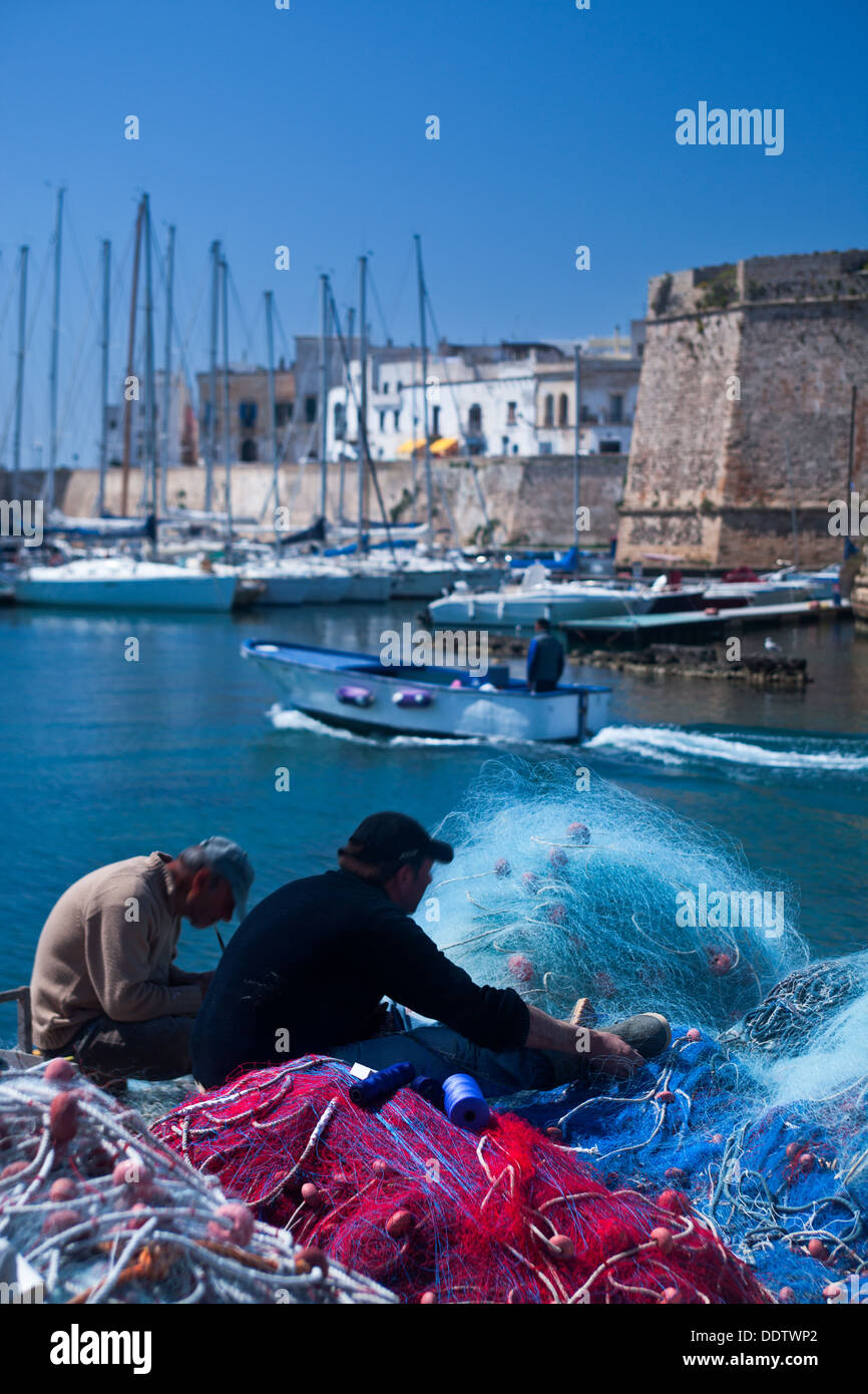 Mending the nets hi-res stock photography and images - Alamy