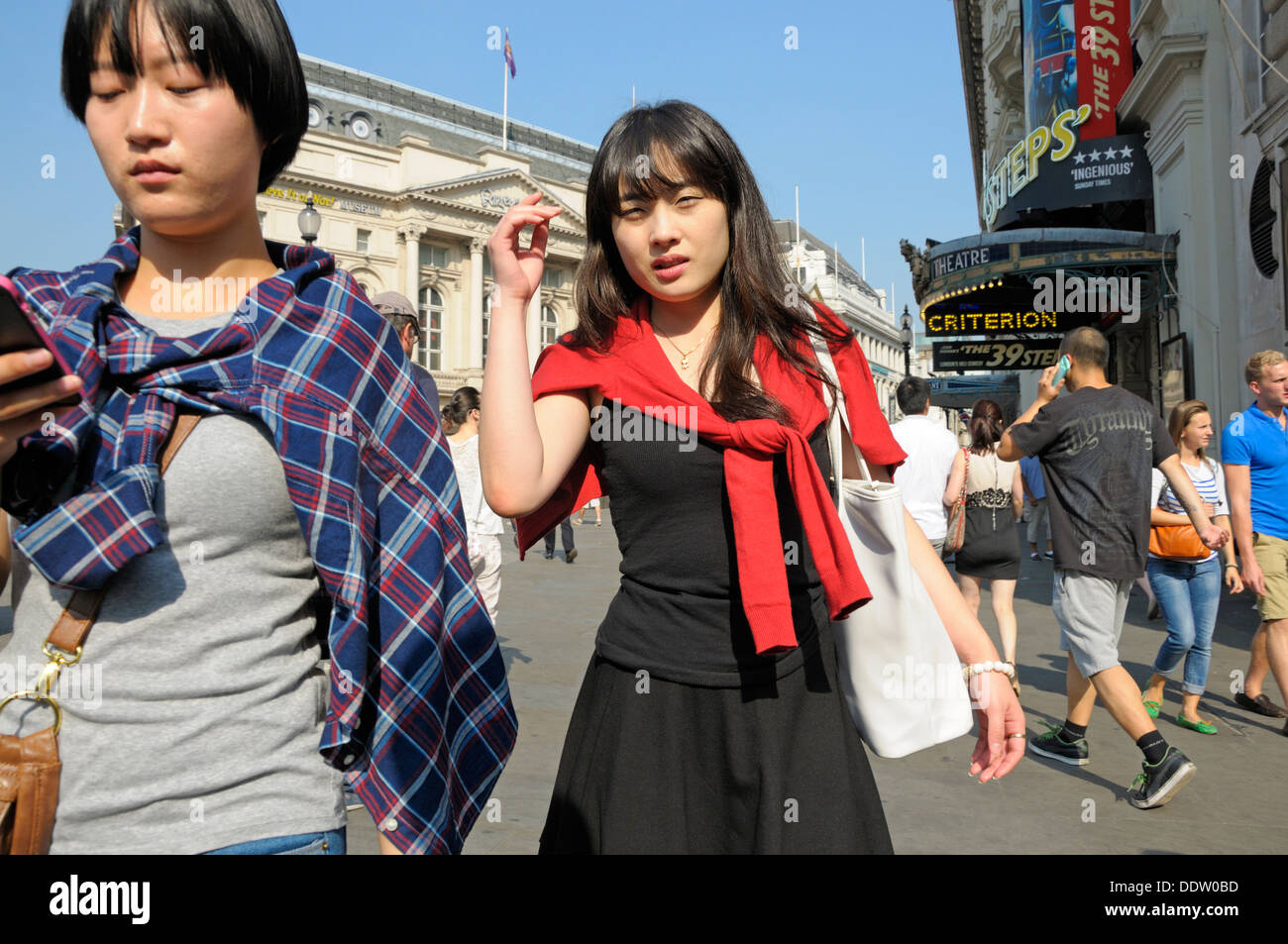 London, England, UK. Japanese tourists in Piccadilly Circus Stock Photo ...
