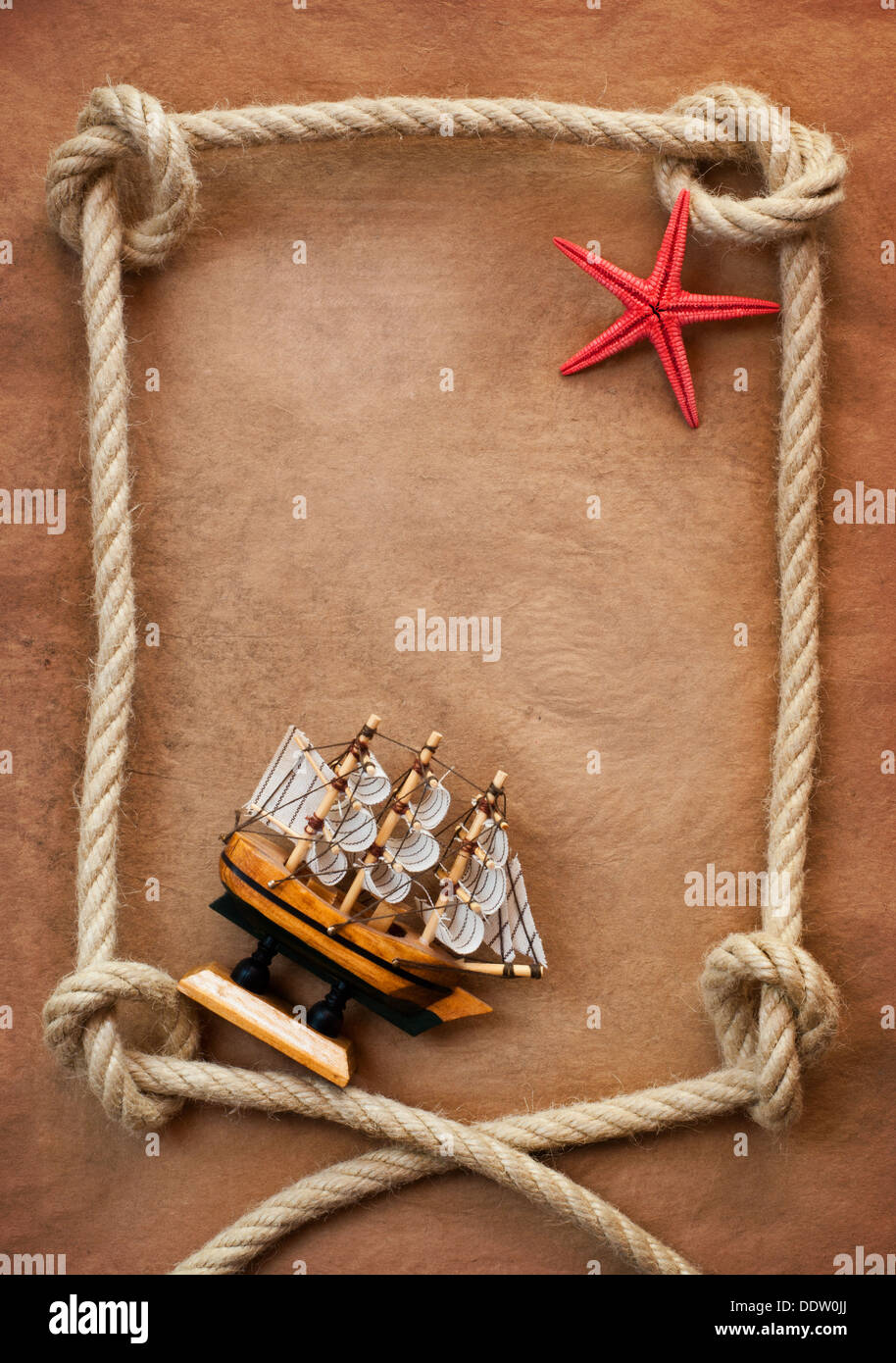 Aged Rope and ship on the old paper background Stock Photo - Alamy