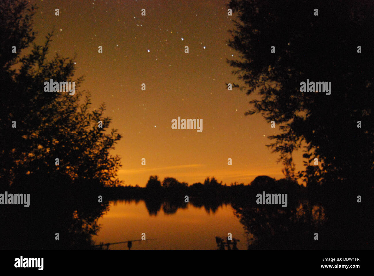 Night sky over lake Stock Photo - Alamy