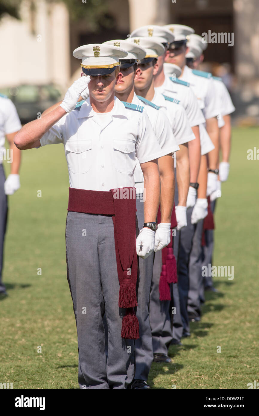 Members of the Citadel Military College corps of cadets salute during ...