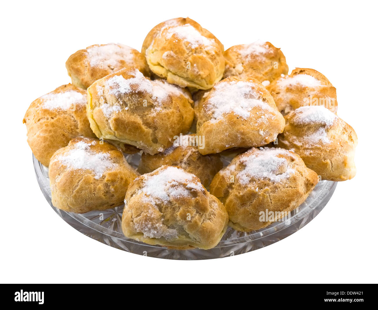 Close-up photo of appetizing pastries filled with custard isolated on ...