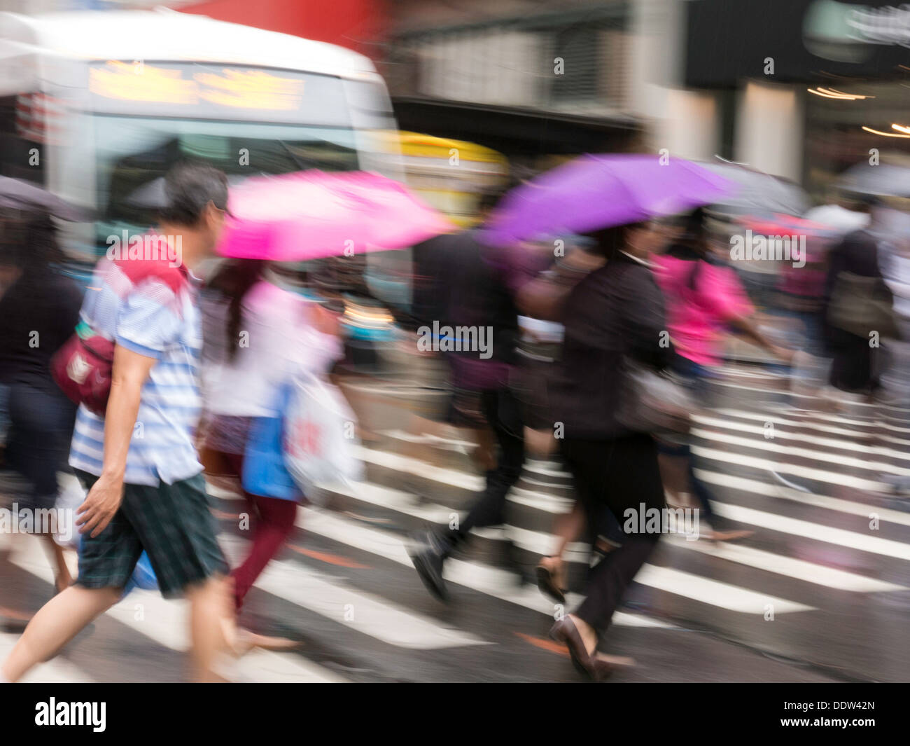 Pedestrians in Rainstorm under Brollies at Herald Square, NYC Stock ...