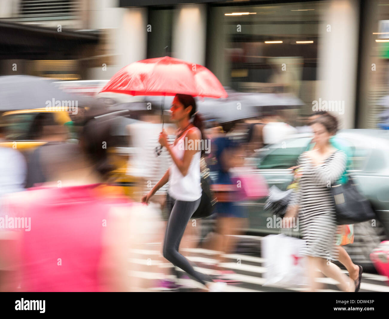 Pedestrians in Rainstorm under Brollies at Herald Square, NYC Stock ...