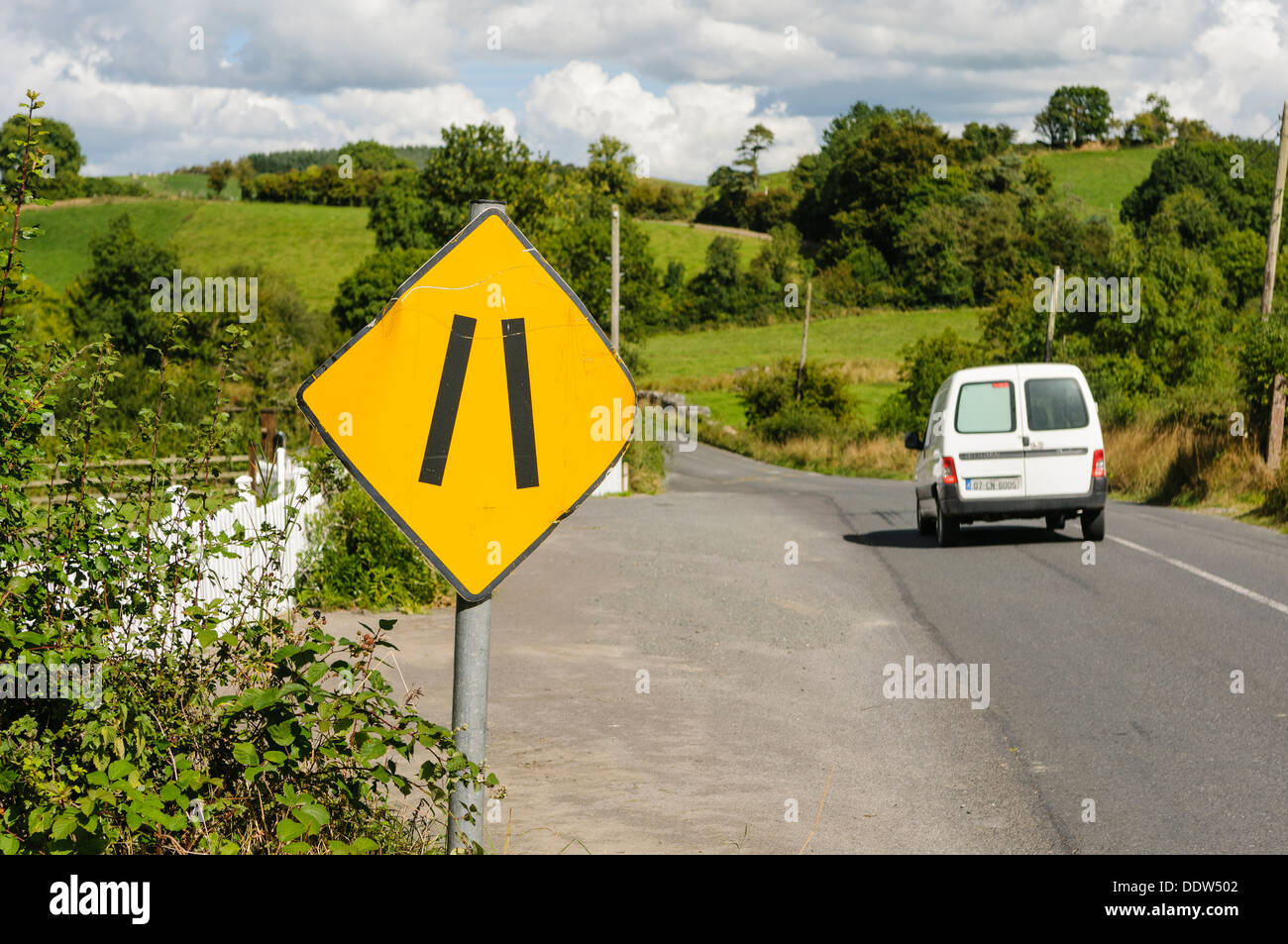 Signs on narrow road warning hi-res stock photography and images - Alamy