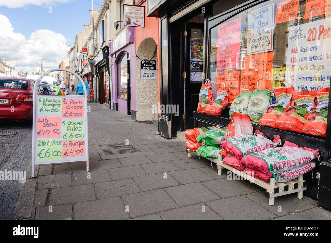Irish village butchers shop with vegetables on display outside Stock ...