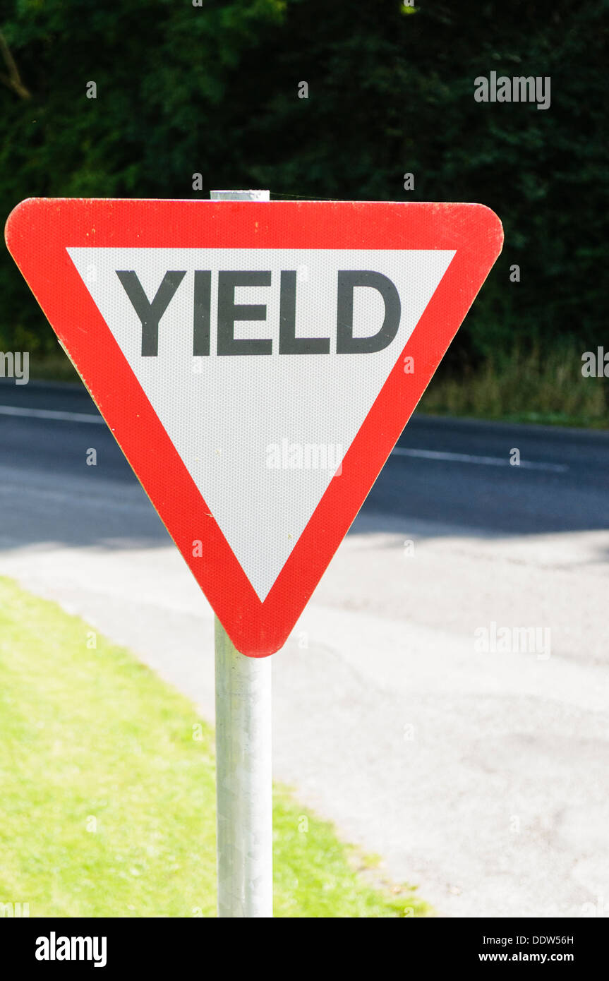 Yield (give-way) sign on an Irish rural road Stock Photo - Alamy